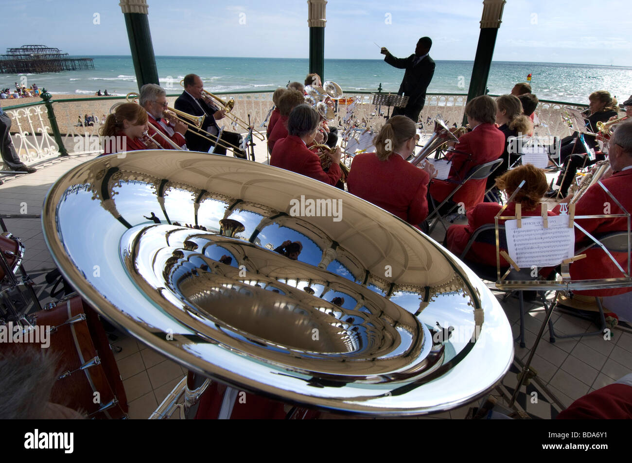 A conductor leads the Patcham silver band in a concert on Brighton ...