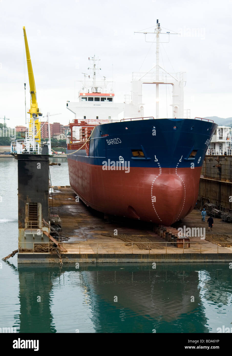 Fishing boat in dry dock after maintenance work in the harbour of ...