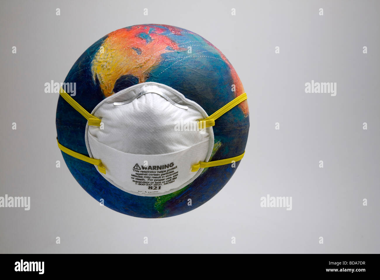 Masked globe hi-res stock photography and images - Alamy