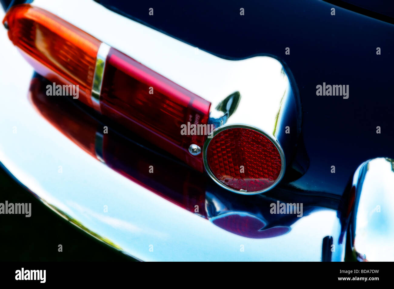 E Type Jaguar rear light housing and chrome bumper Stock Photo - Alamy