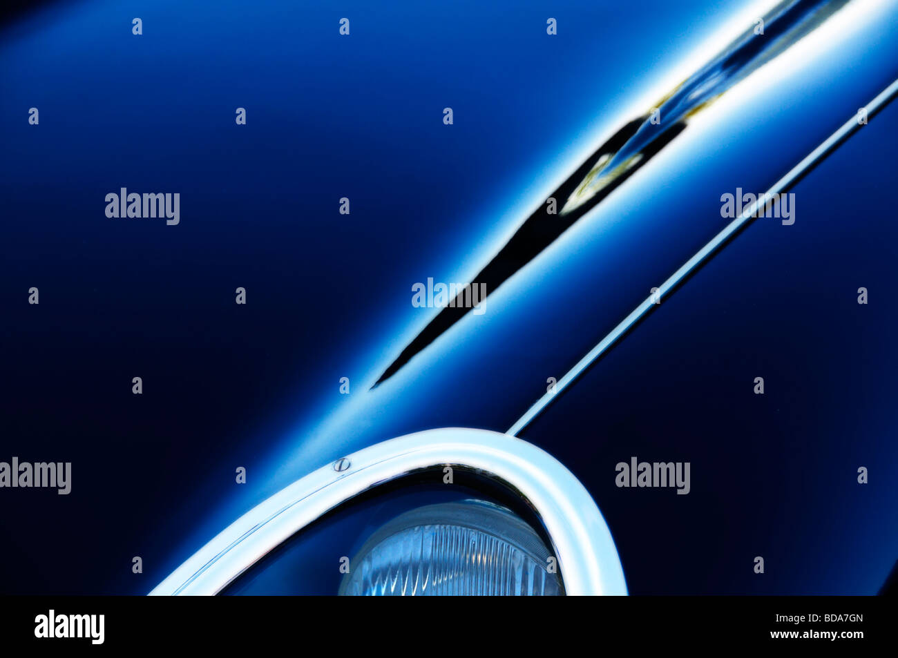 E Type Jaguar bonnet and light Stock Photo - Alamy