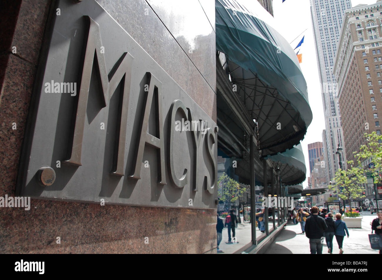 An oblique view of the Macy's entrance sign on 34th Street with the ...