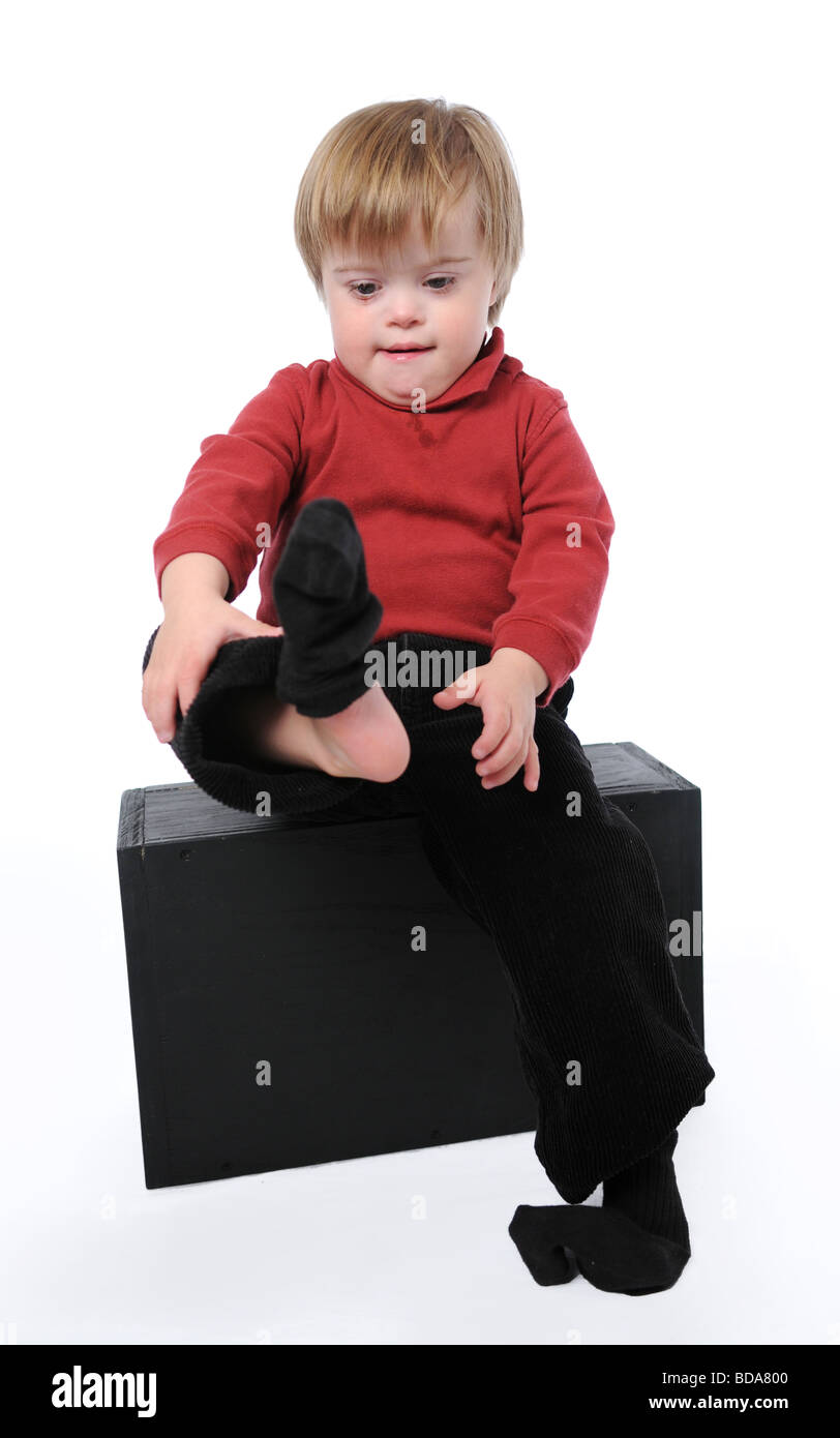 Child Putting On Socks