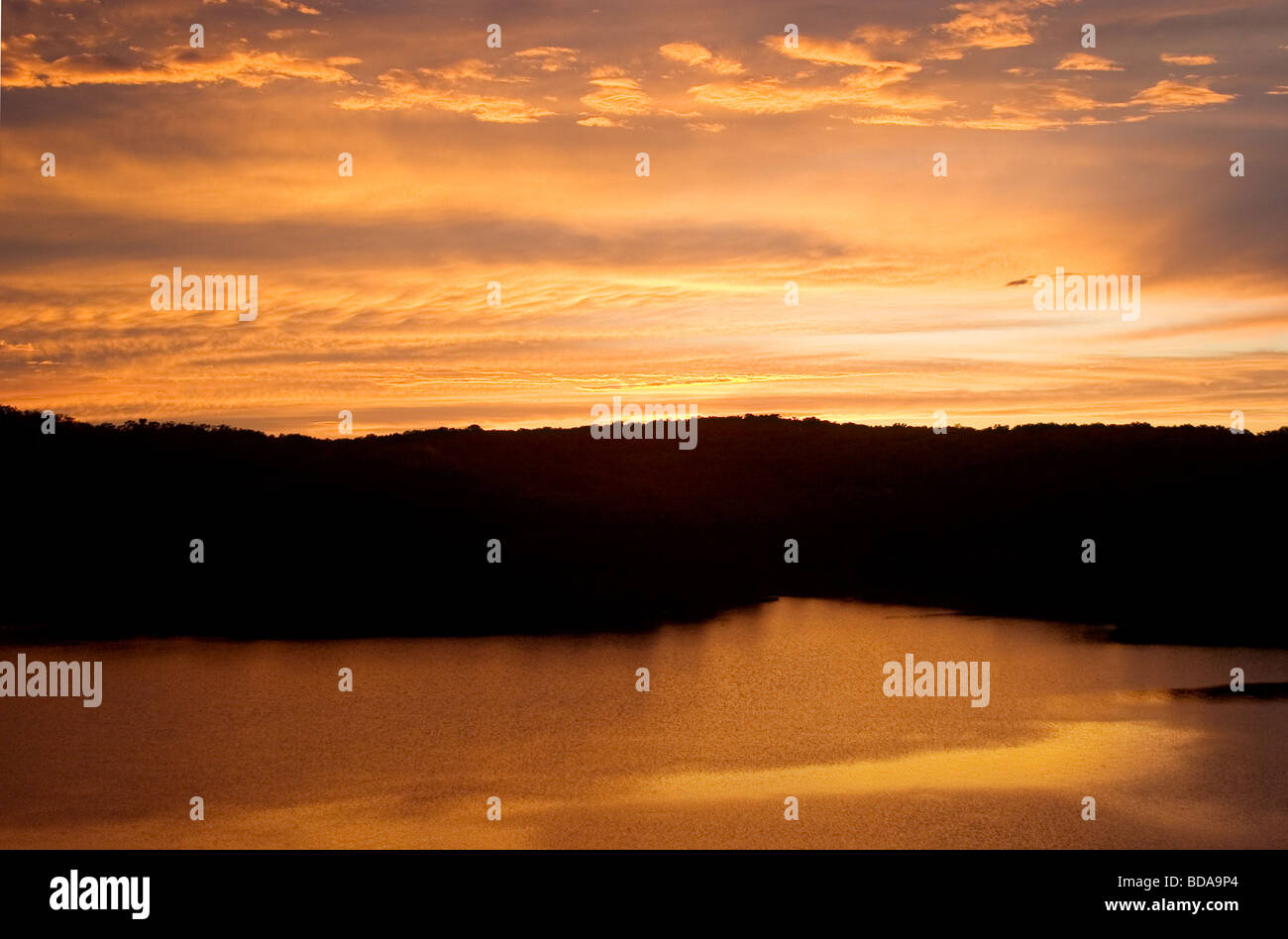 A deeply saturated sunset over Lake of the Ozarks, Lakeside, Missouri ...