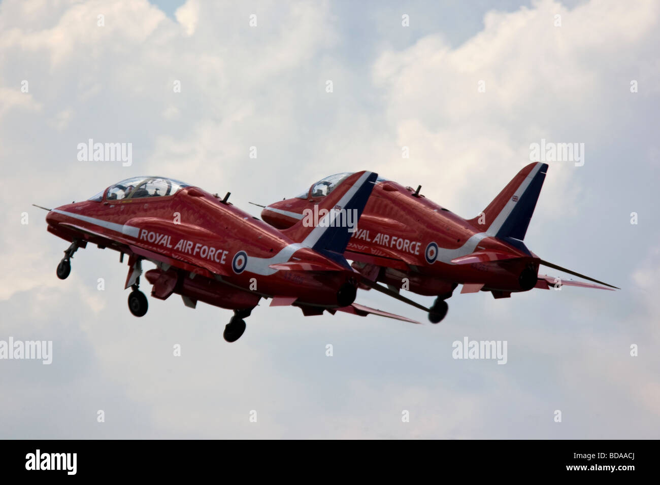 Two RAF Red Arrows BAe Systems Hawk Jets taking off in formation at the ...