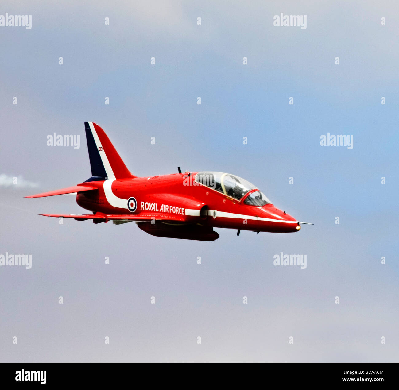 RAF Red Arrows Team Hawk Jet in Flight with white smoke trail Stock ...