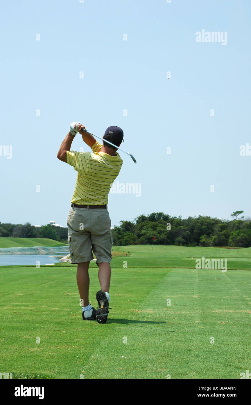 Golfer in the playing on golf course Stock Photo - Alamy