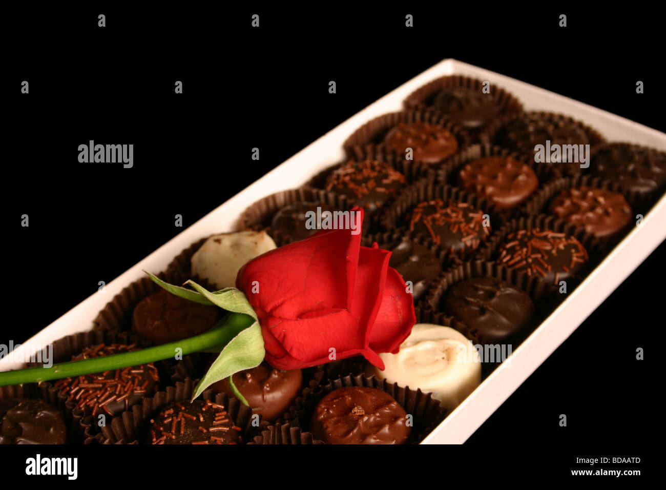 Box of chocolates and red roses hi-res stock photography and images - Alamy