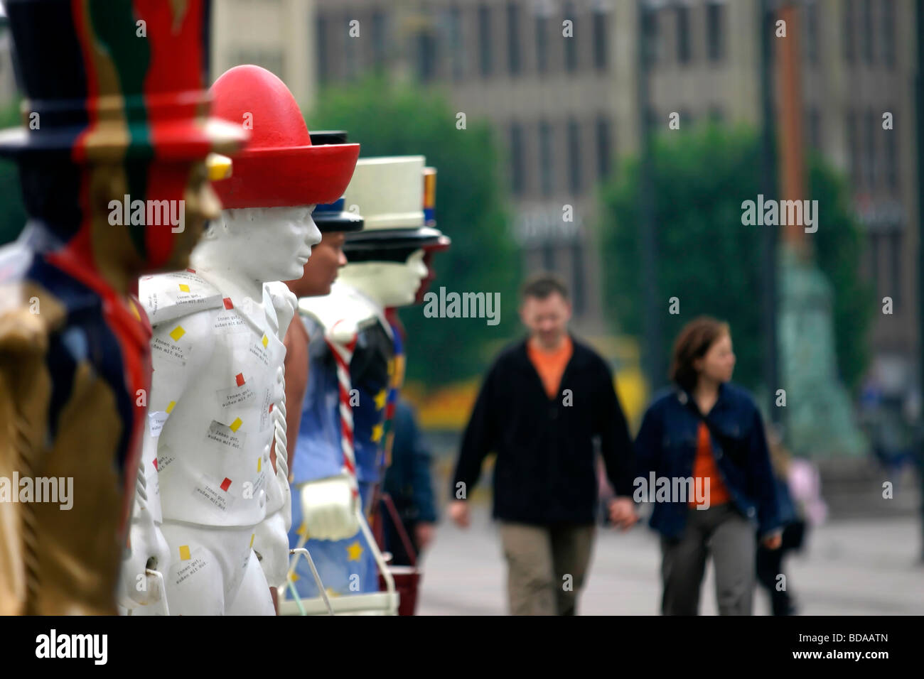 People Walking Toward the Hans Hummel Symbolic Figures in Hamburg ...