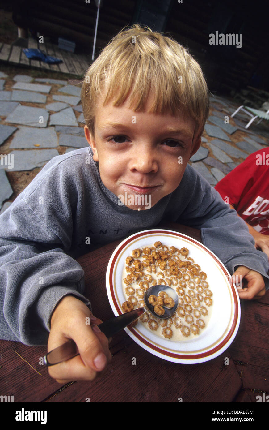 child eating breakfast cereal Stock Photo - Alamy