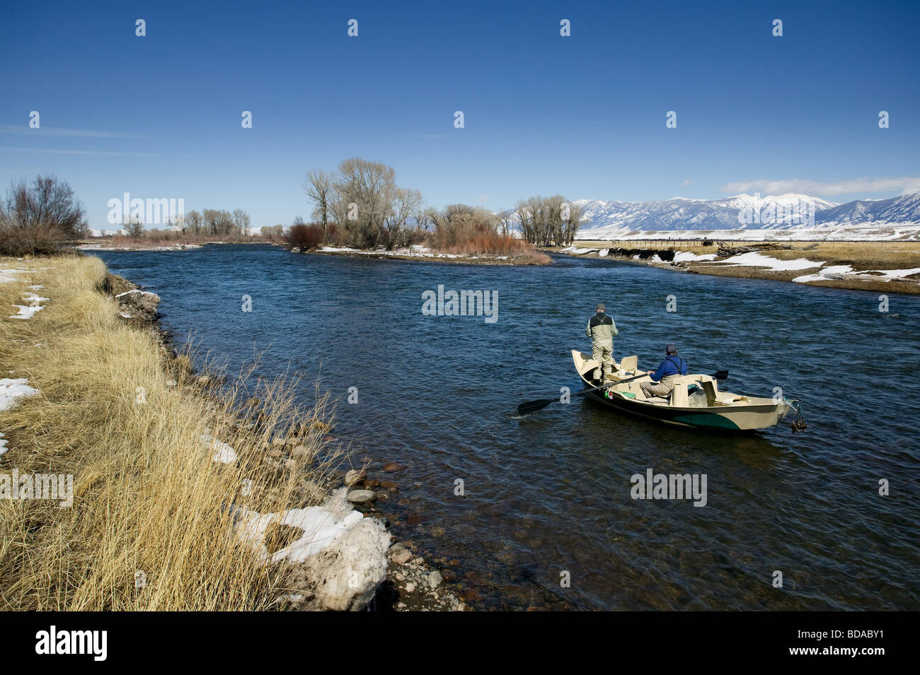 Fly fishing the Madison river from a drift boat Stock Photo - Alamy