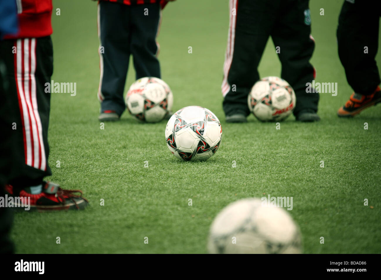 Chinese boy playing soccer on hi-res stock photography and images - Alamy