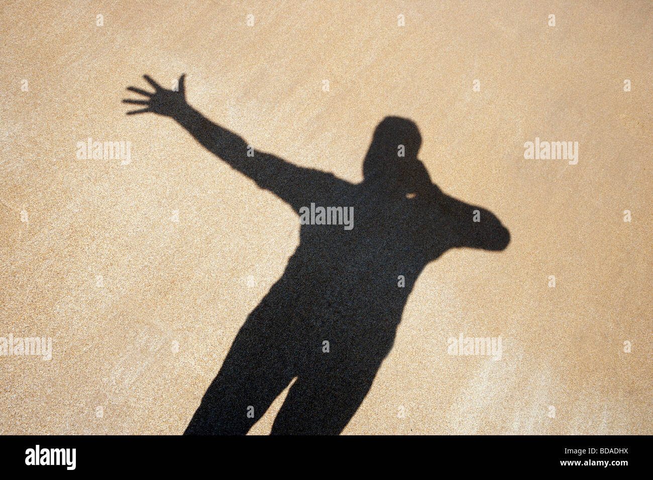 Human shadow on sand Stock Photo - Alamy