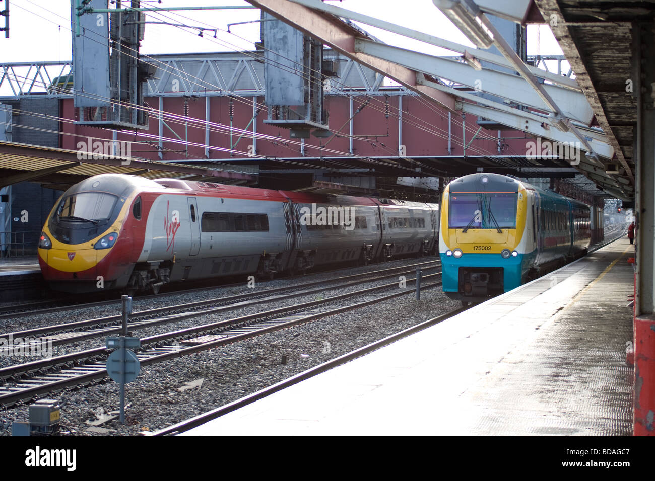 Pendolino and a Class 175, 'Coradia' waiting in Crewe station, Cheshire ...