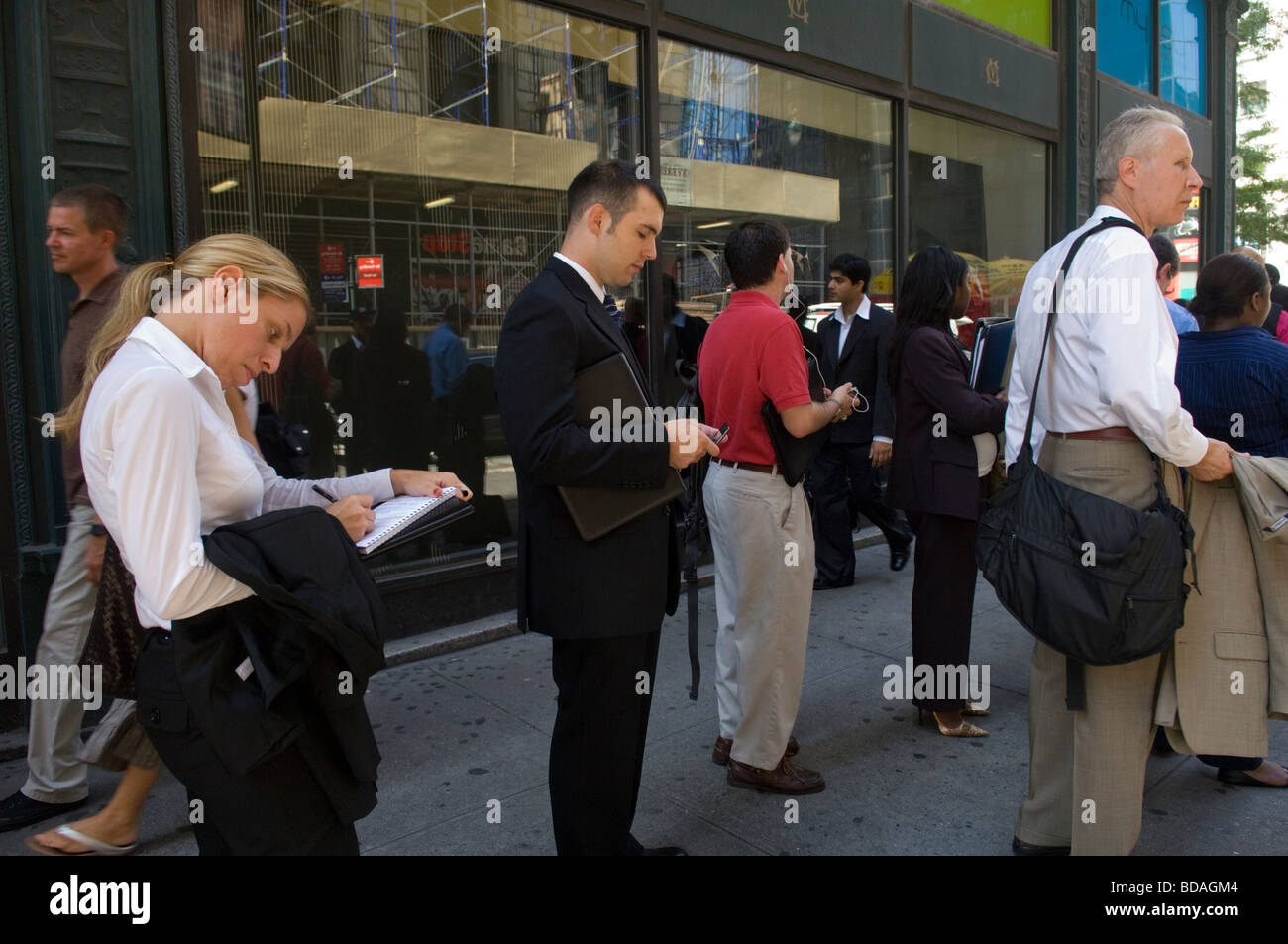 Job seekers line up for a job fair in midtown in New York Stock Photo ...