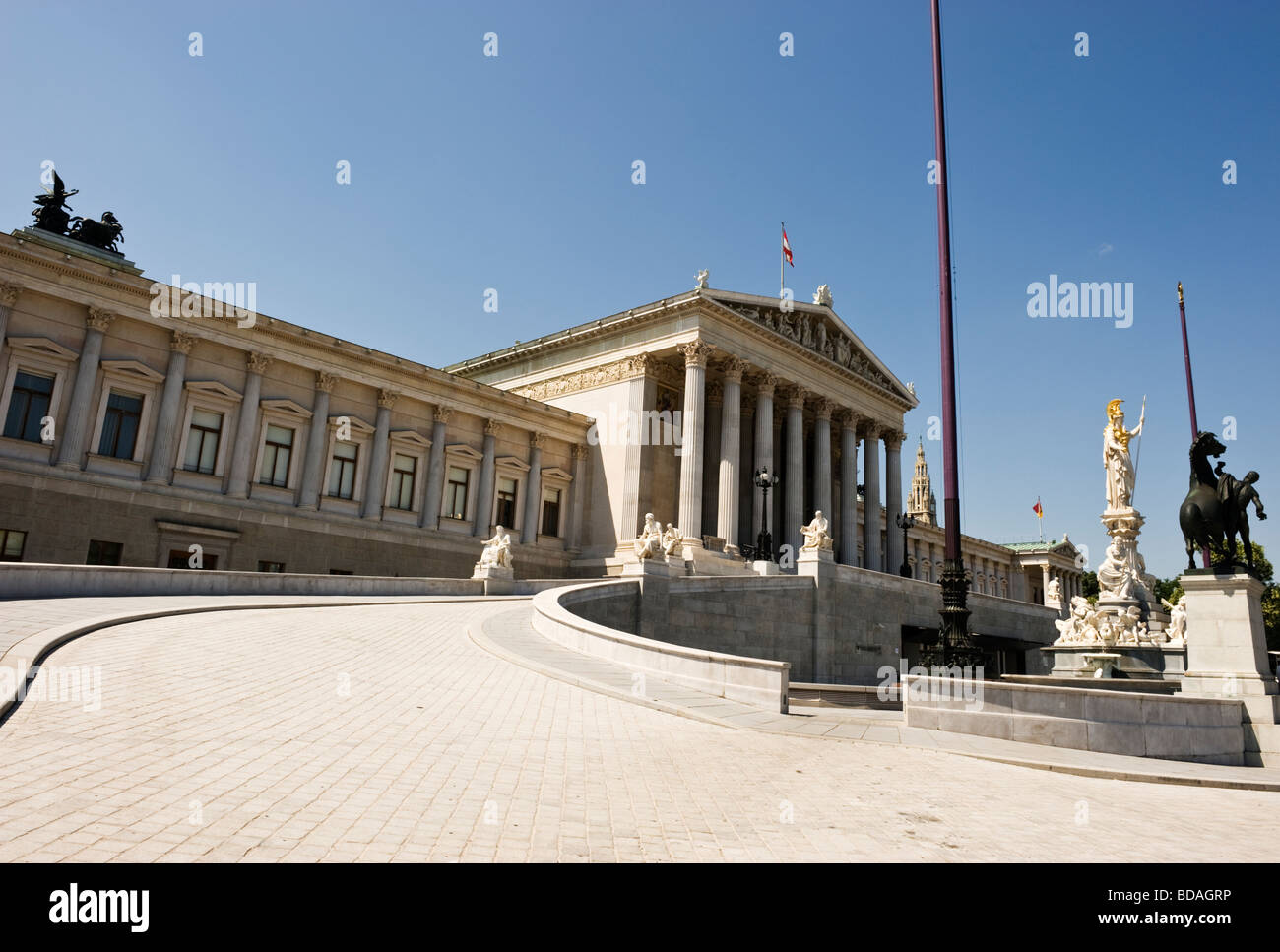 wide road leading to the Austrian Parliament building Ringstrasse ...