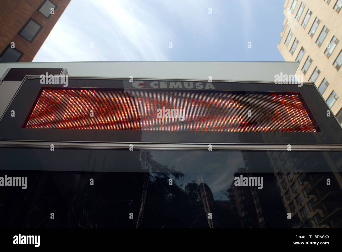 New route signs at bus shelters in New York inform commuters of time ...
