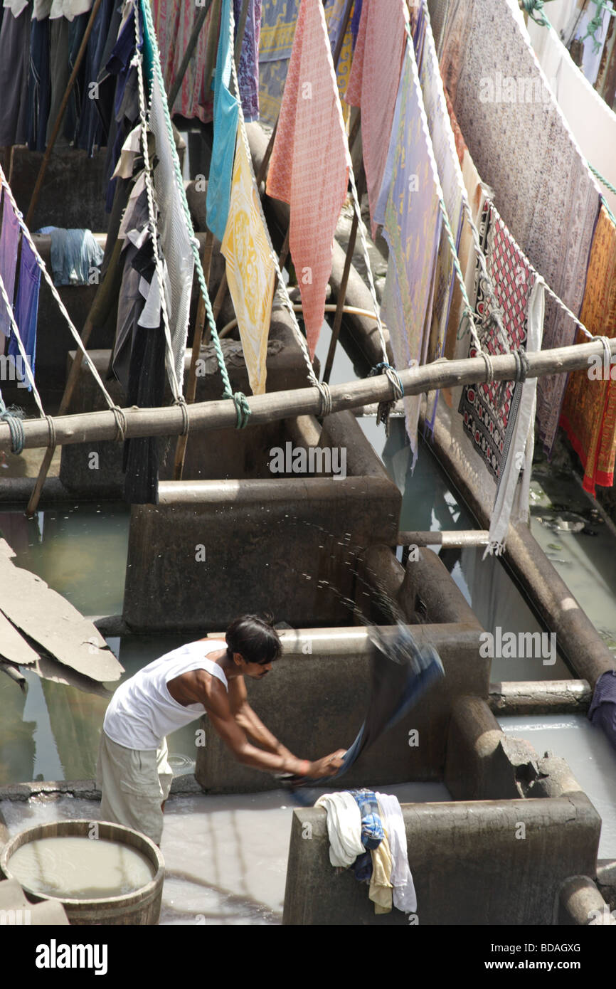 Man washing clothes at the Mahalaxmi Dhobi Ghat Mumbai India Stock ...