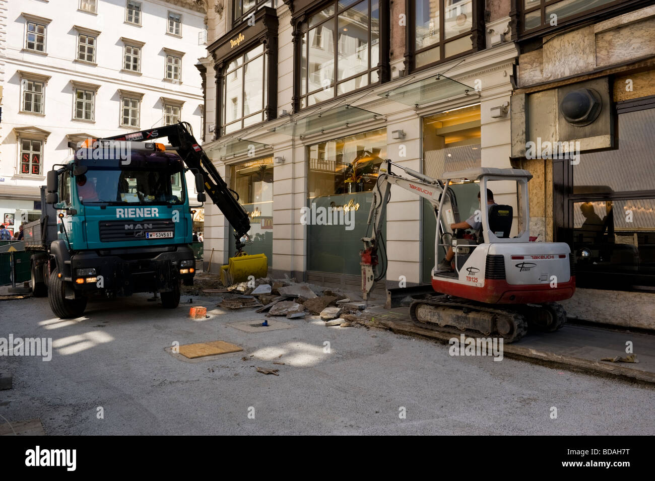 mechanical digger, pavement repair work and road works in Vienna ...