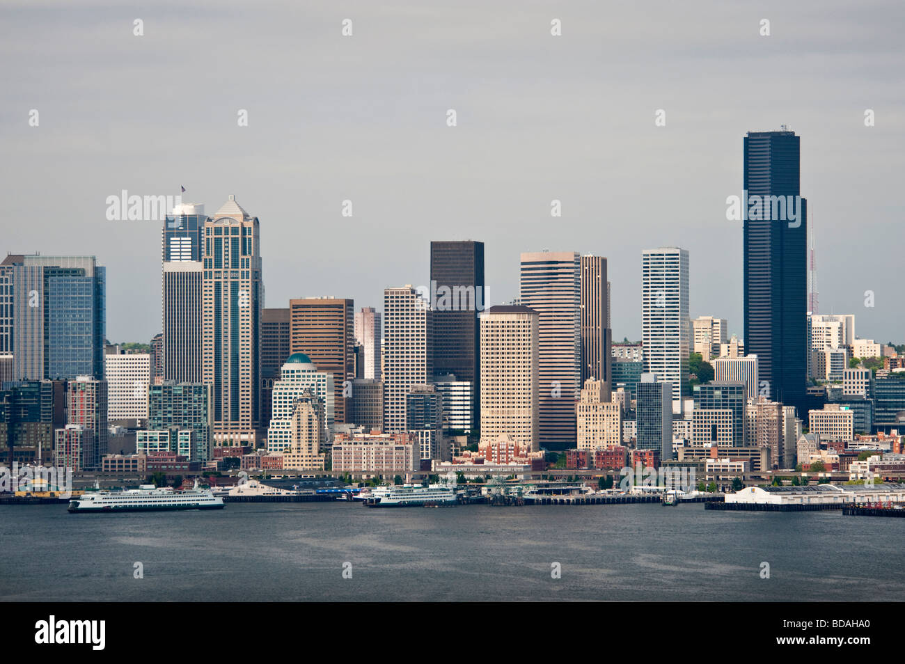 The Seattle skyline as seen from West Seattle. Ships and boats ply the ...