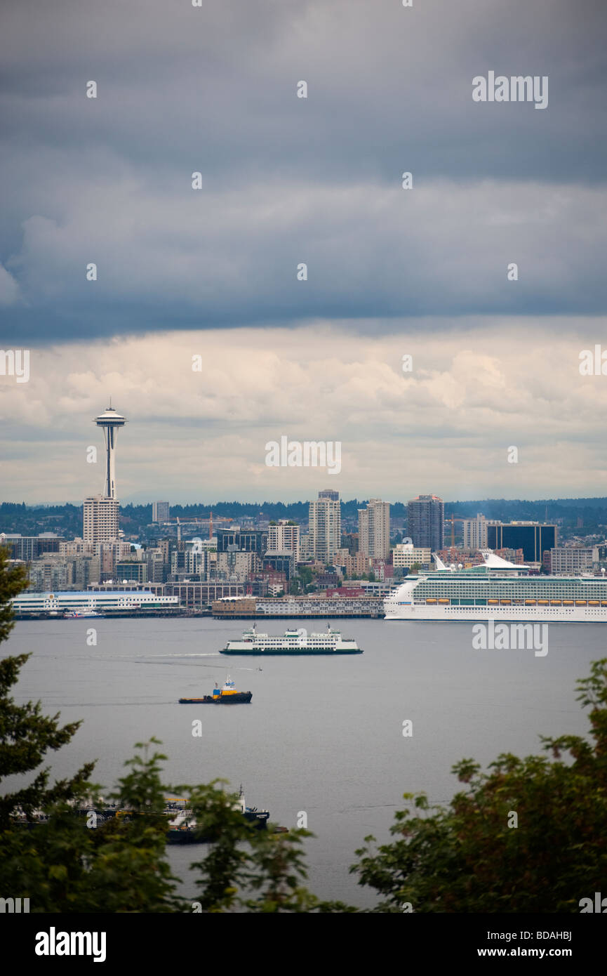 The Seattle skyline as seen from West Seattle. Ships and boats ply the ...
