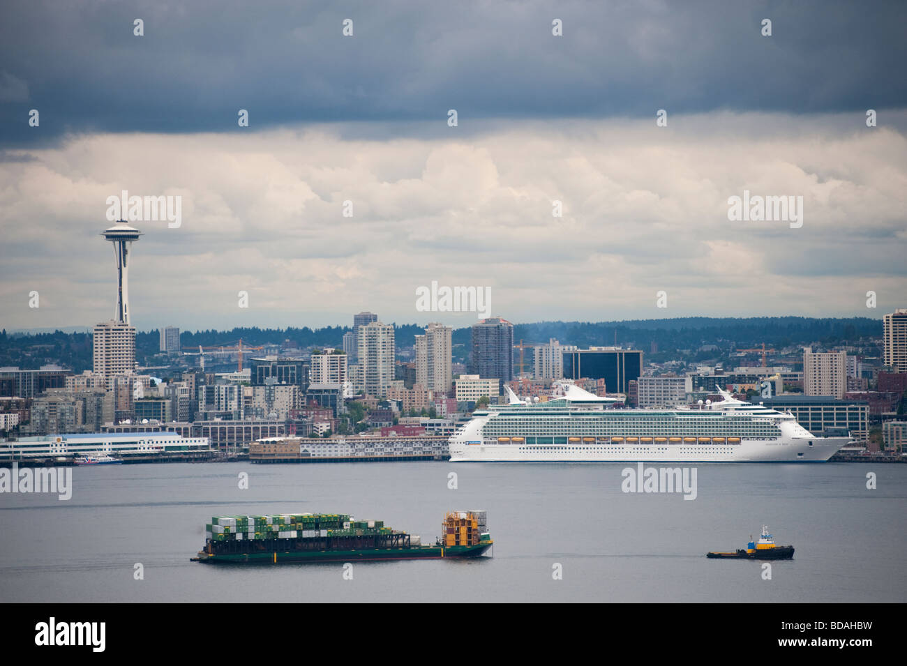 The Seattle skyline as seen from West Seattle. Ships and boats ply the ...