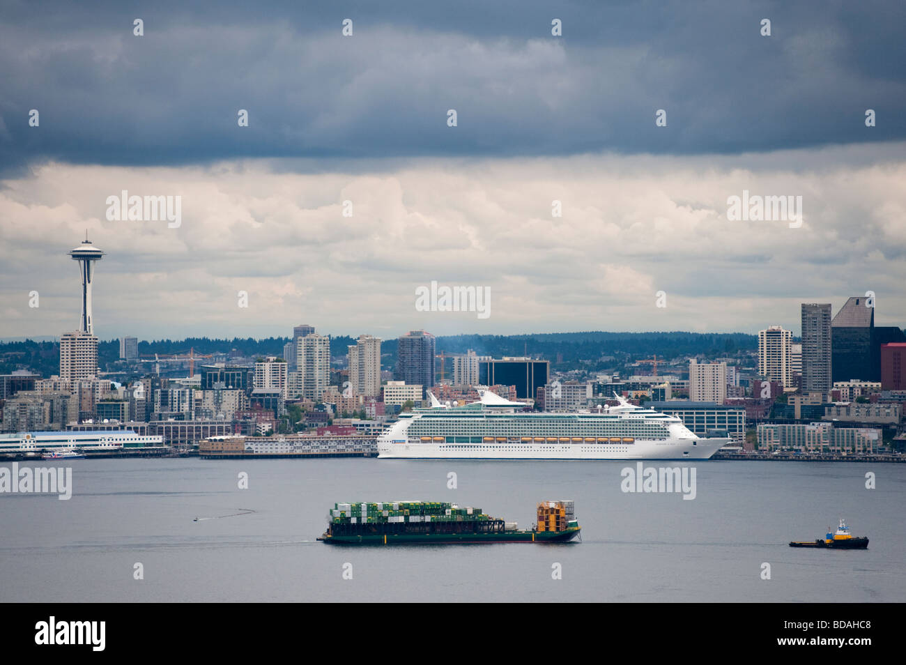 The Seattle skyline as seen from West Seattle. Ships and boats ply the ...