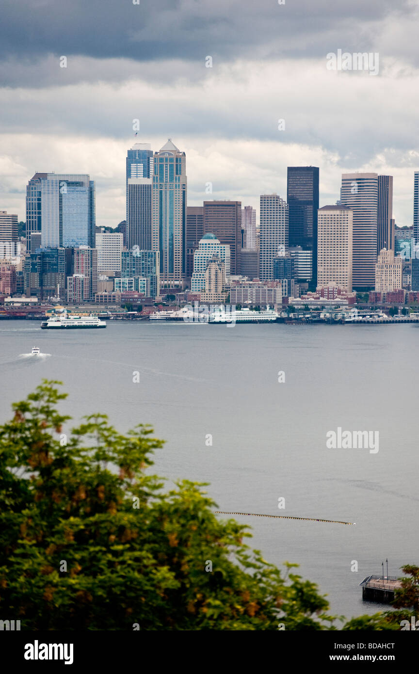 The Seattle skyline as seen from West Seattle. Ships and boats ply the ...