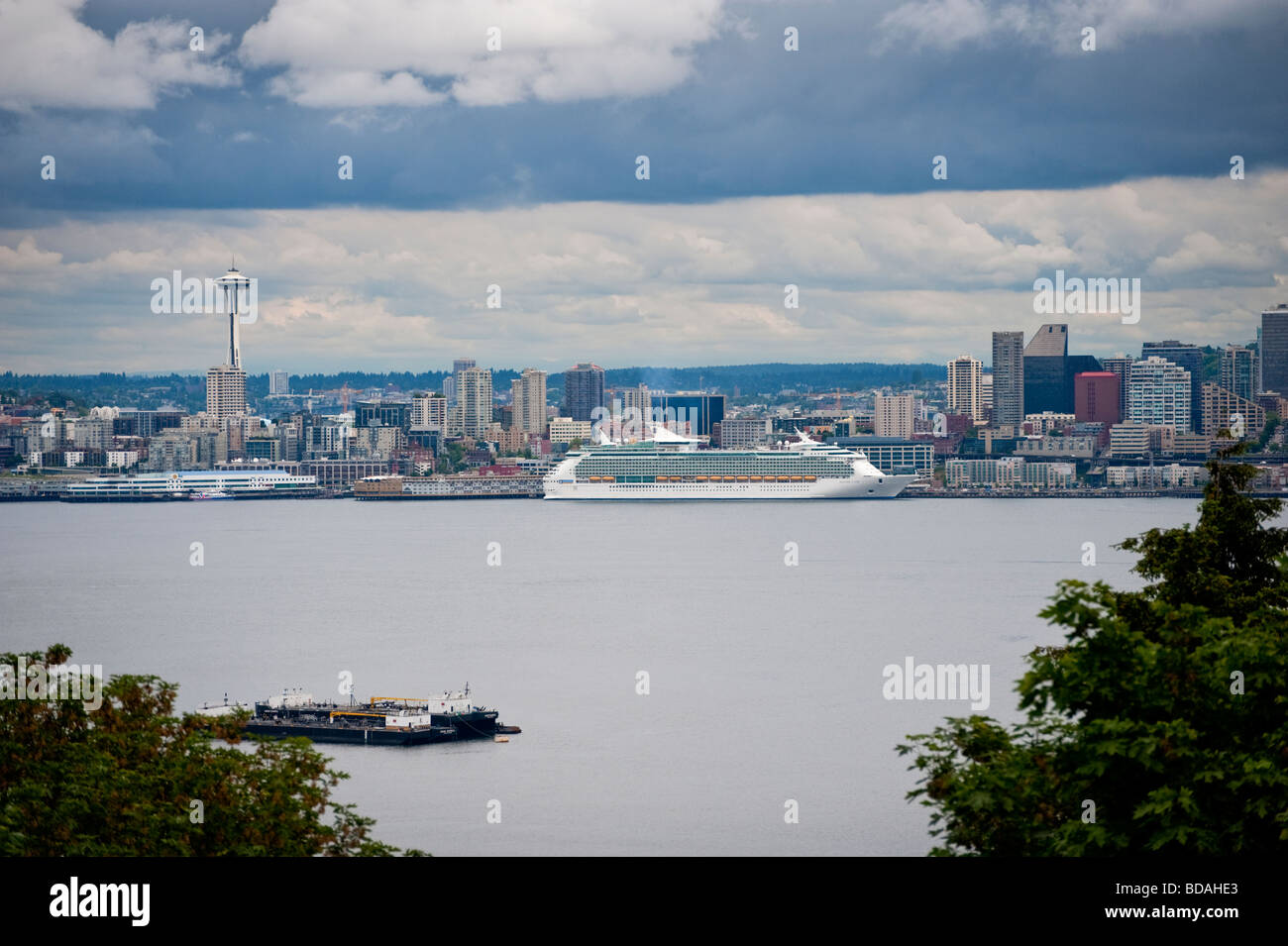 The Seattle skyline as seen from West Seattle. Ships and boats ply the ...