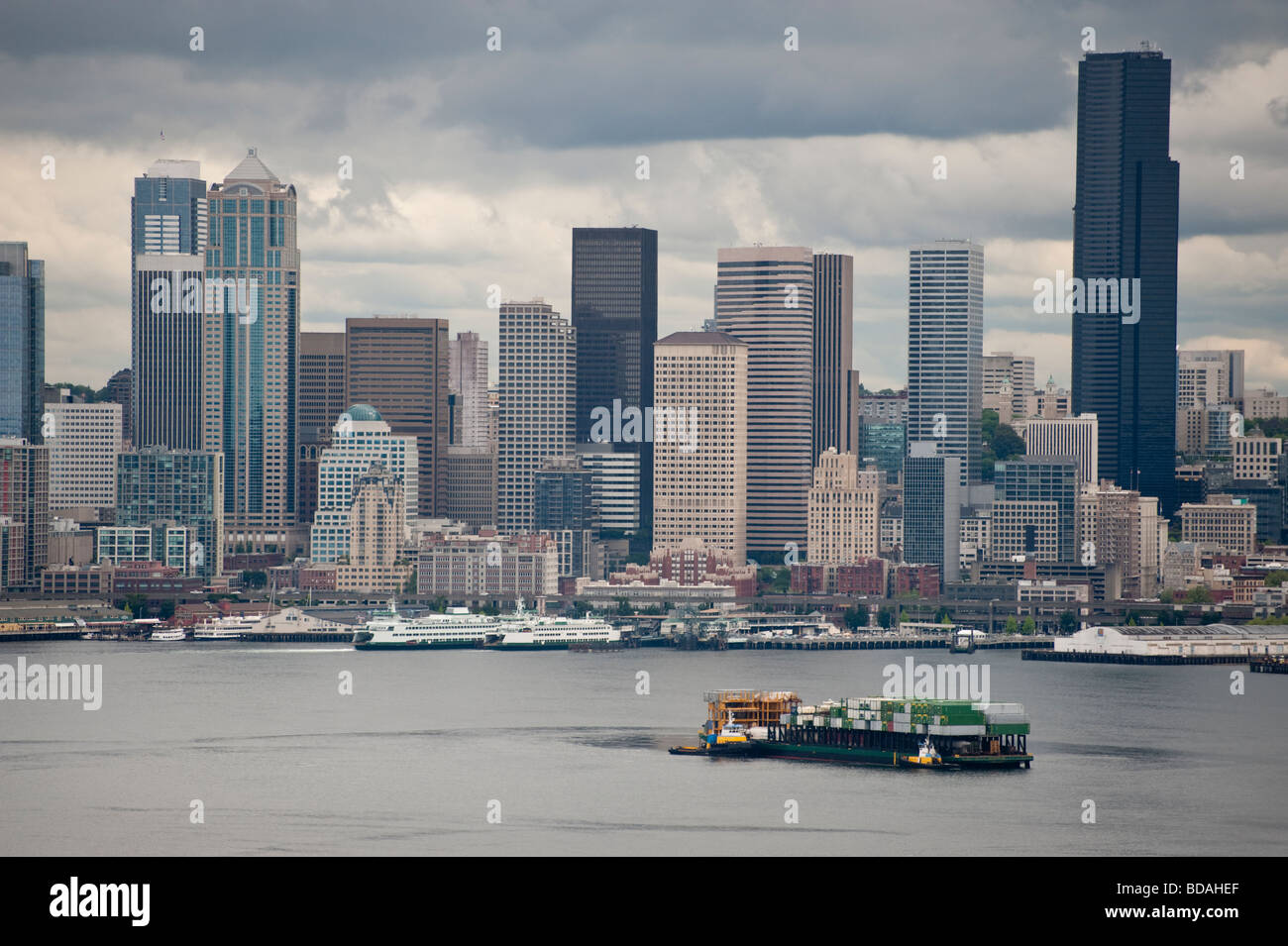 The Seattle skyline as seen from West Seattle. Ships and boats ply the ...