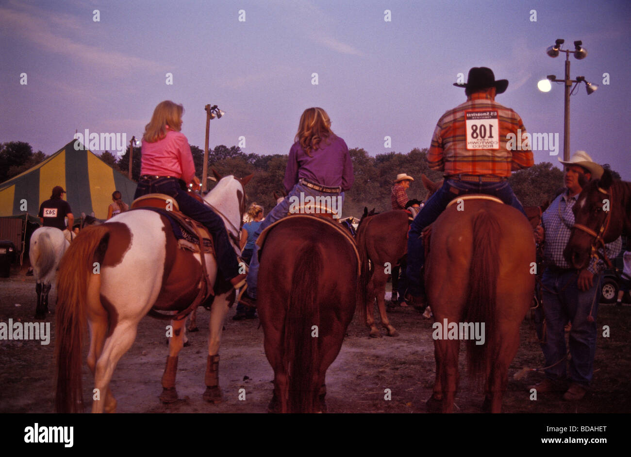 Group of riders put horses through paces for rodeo country fair judges ...