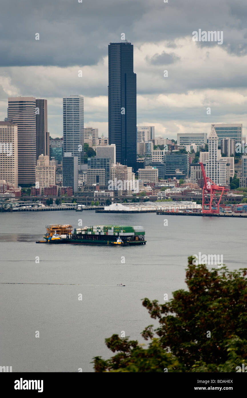 The Seattle skyline as seen from West Seattle. Ships and boats ply the ...