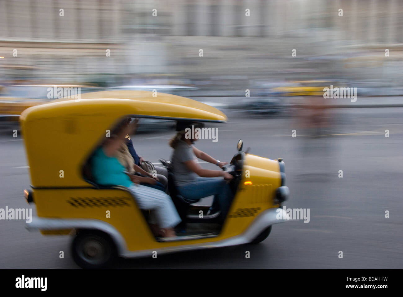 Three wheeled taxi in front hi-res stock photography and images - Alamy