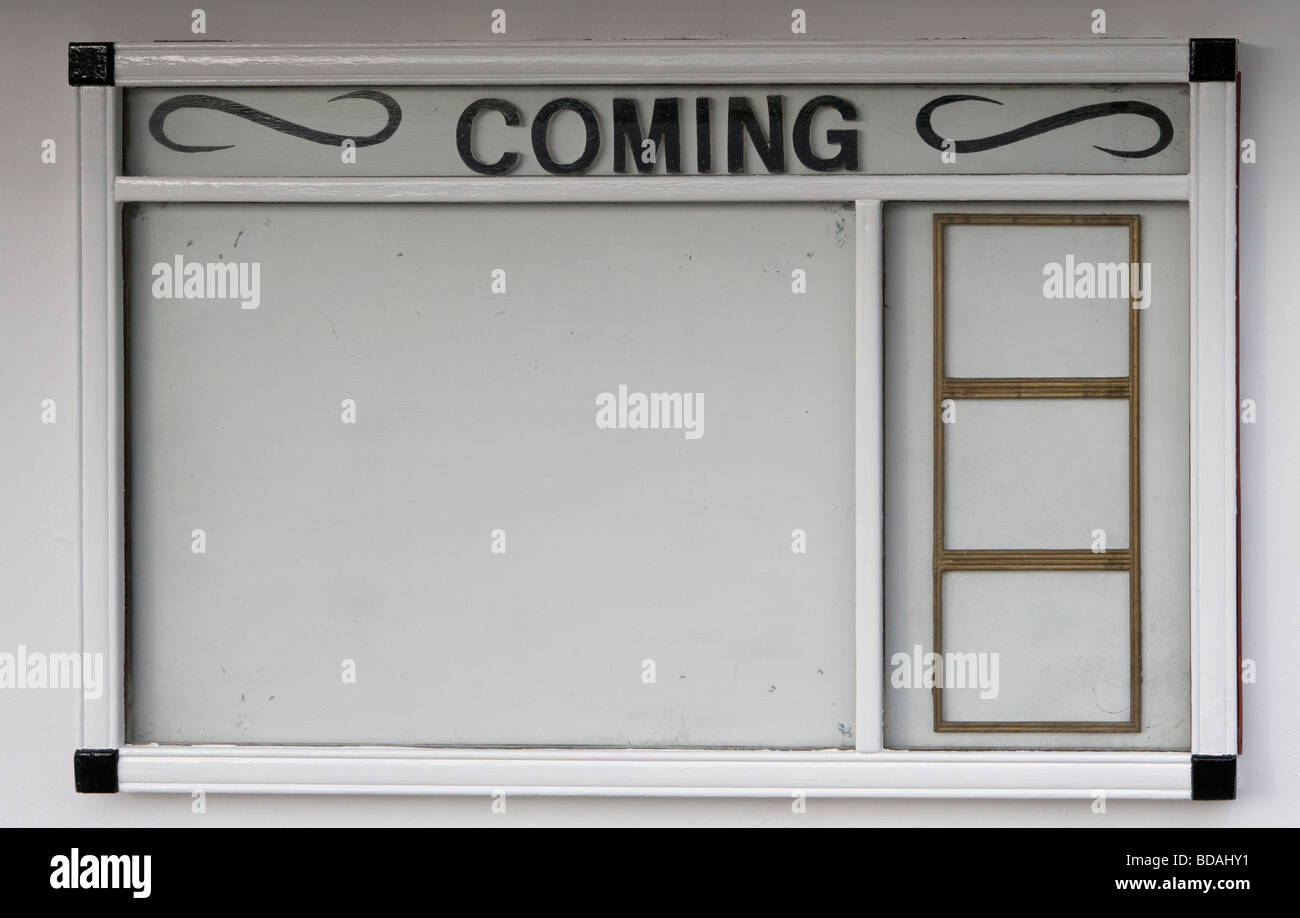 coming soon board outside an old cinema in the uk Stock Photo - Alamy