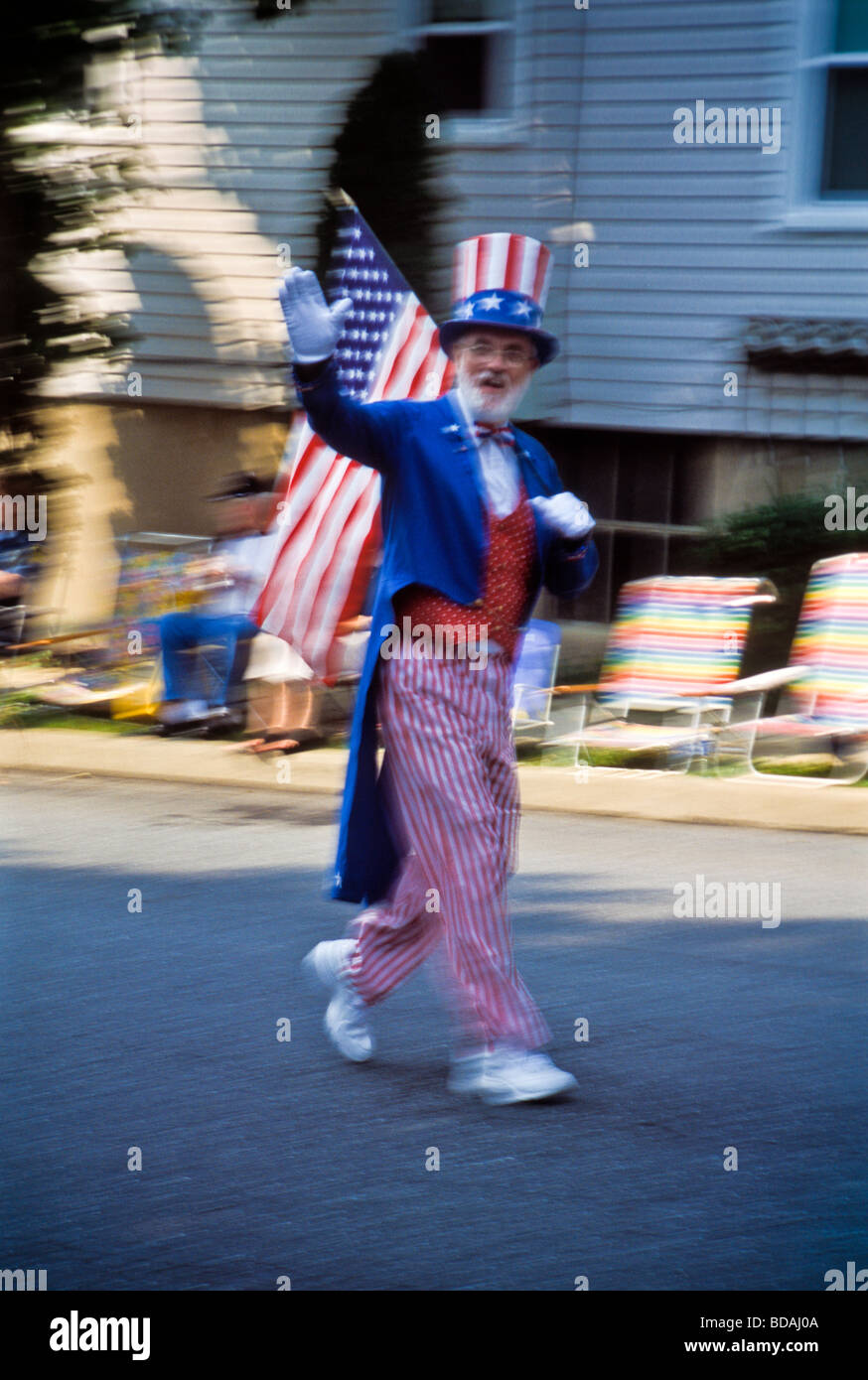 Patriotic Uncle Sam marching in small town parade Stock Photo - Alamy