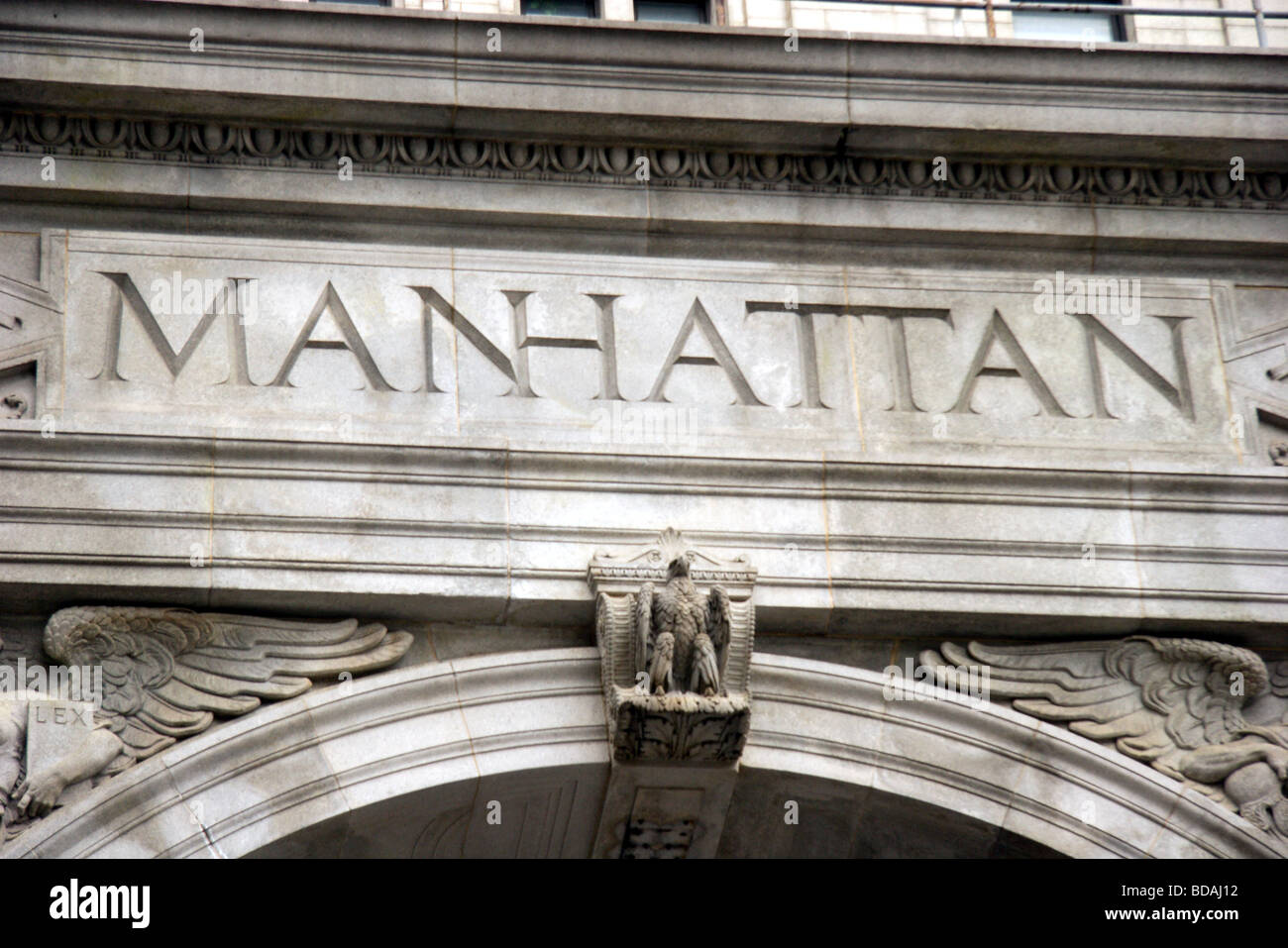 The words Manhattan, engraved in stone in building, lower Manhattan ...