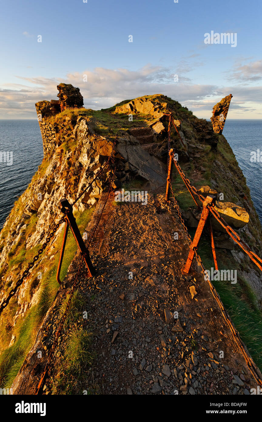 Narrow cliff top bridge leading to Fast Castle (Castle Knowe) in the ...