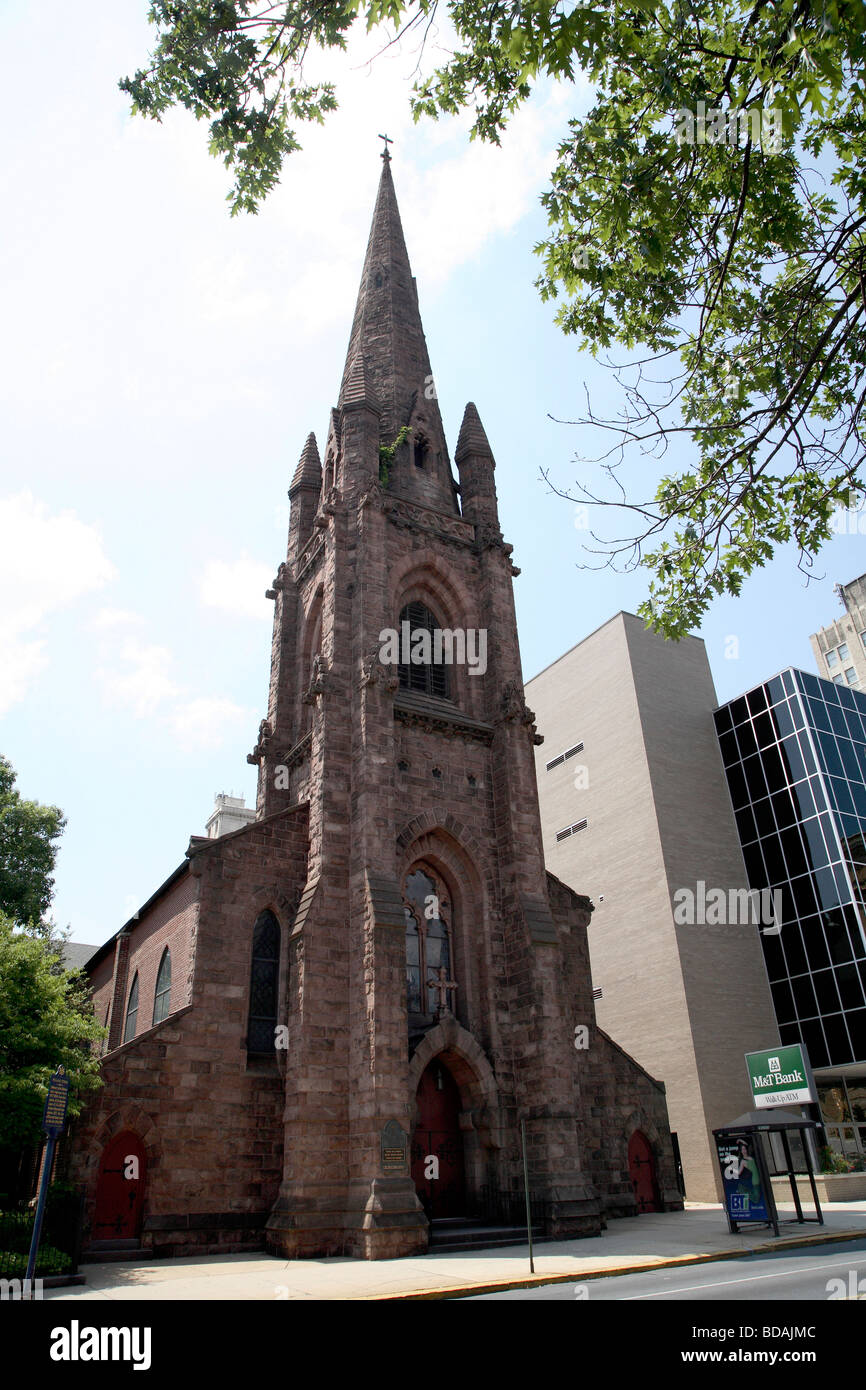 Large red brick and brownstone Neo-Gothic or Gothic Revival church ...