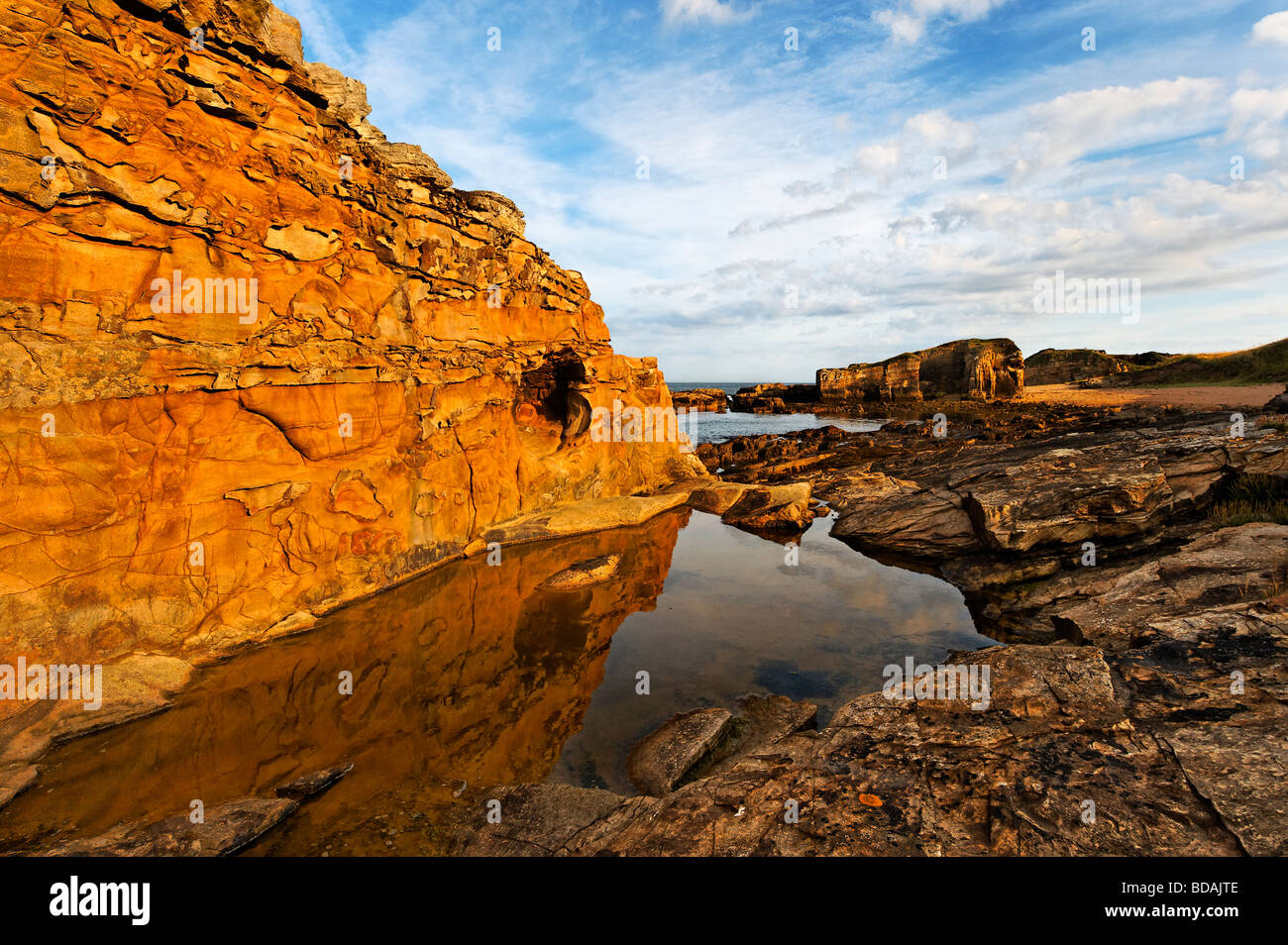 Cliffs at Rumbling Kern bathed in warm evening sunlight Stock Photo - Alamy