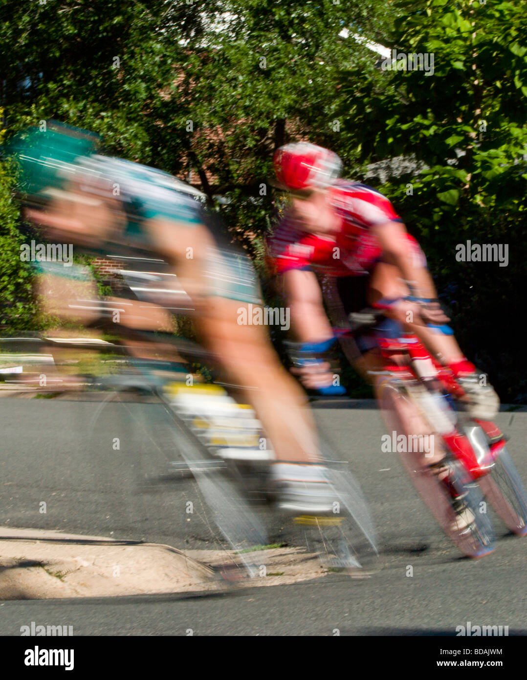 Male athletes competing in a bike criterion race in North Boulder Park ...