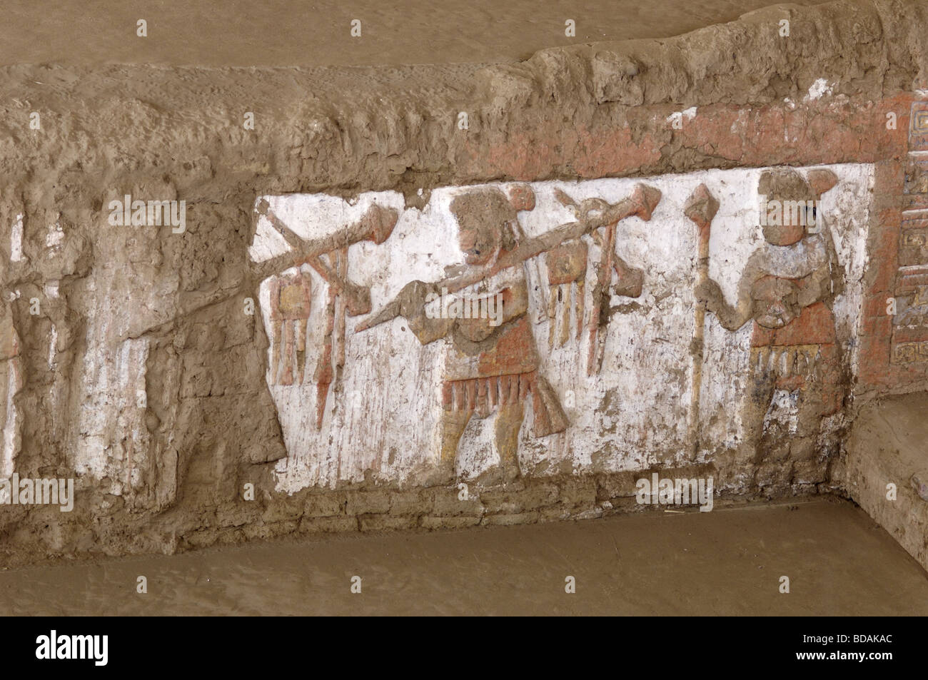 Mural depicting warriors with prisoners in Huaca de la Luna adobe mud ...