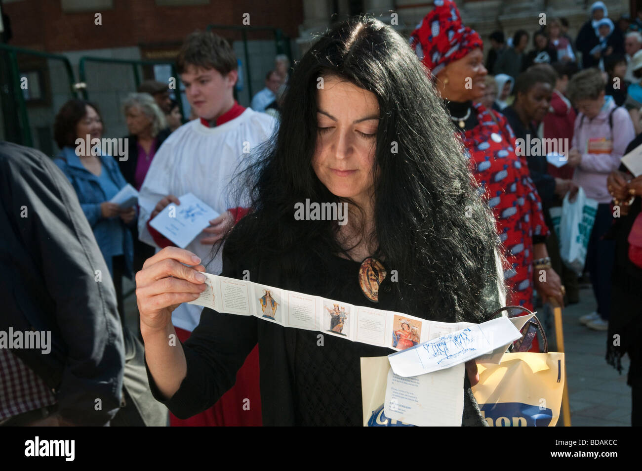 Woman with images of the Virgin Mary, Rosary Crusade of Reparation ...