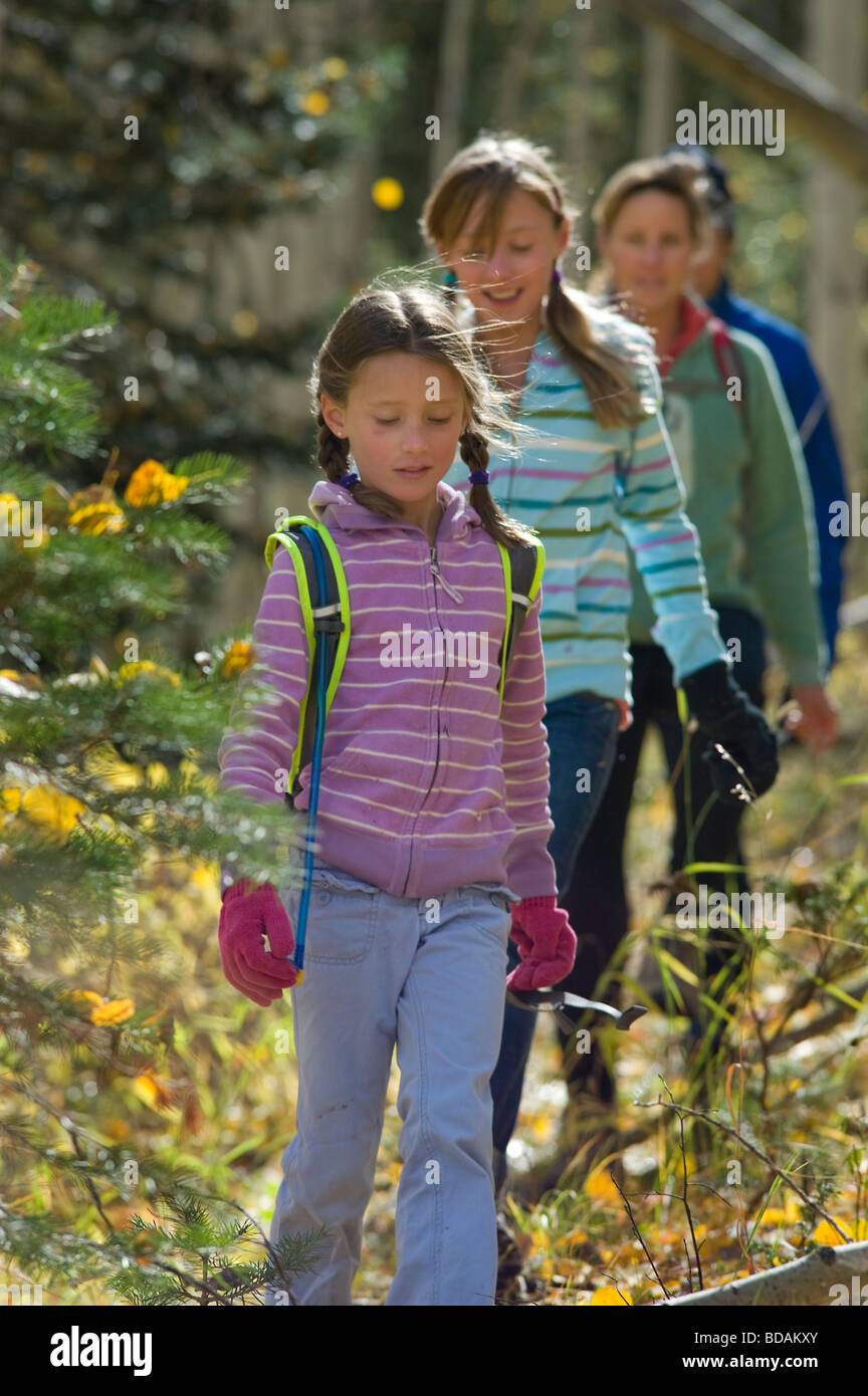 Family hiking in Fall colors Stock Photo - Alamy