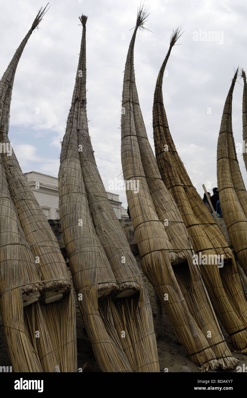 Narrow reed fishing boats at Huanchaco Peru Stock Photo - Alamy