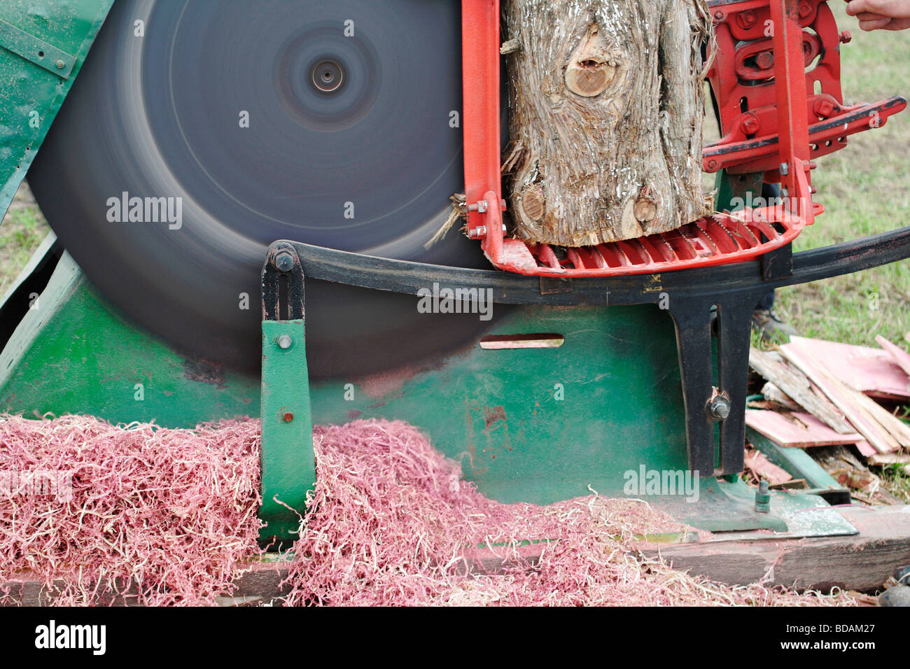 Spinning shingle saw cutting red cedar shingles Stock Photo - Alamy