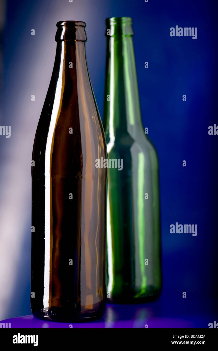 object on blue Glass bottle close up Stock Photo - Alamy