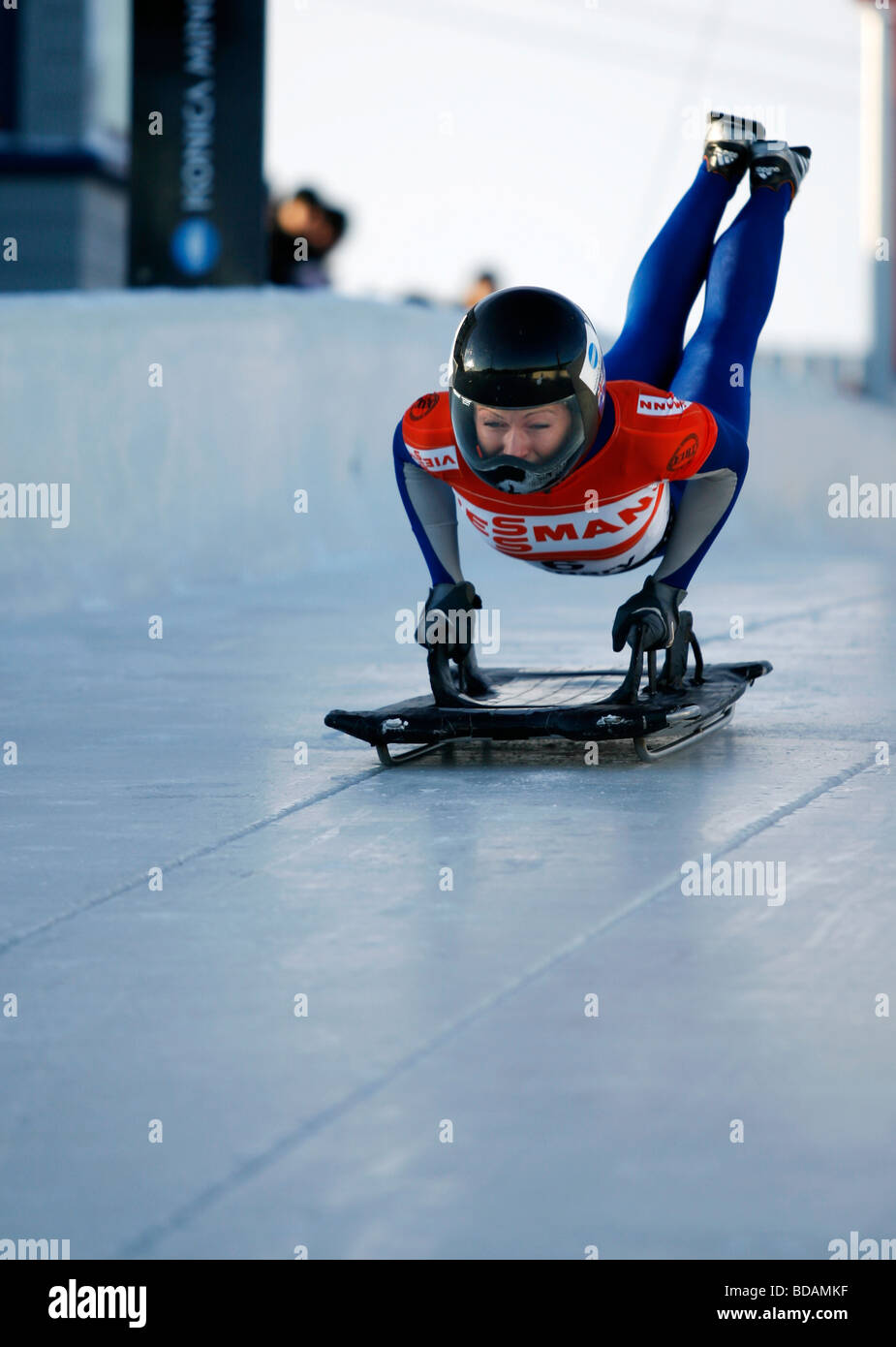 A skeleton racer dives down a track Stock Photo - Alamy