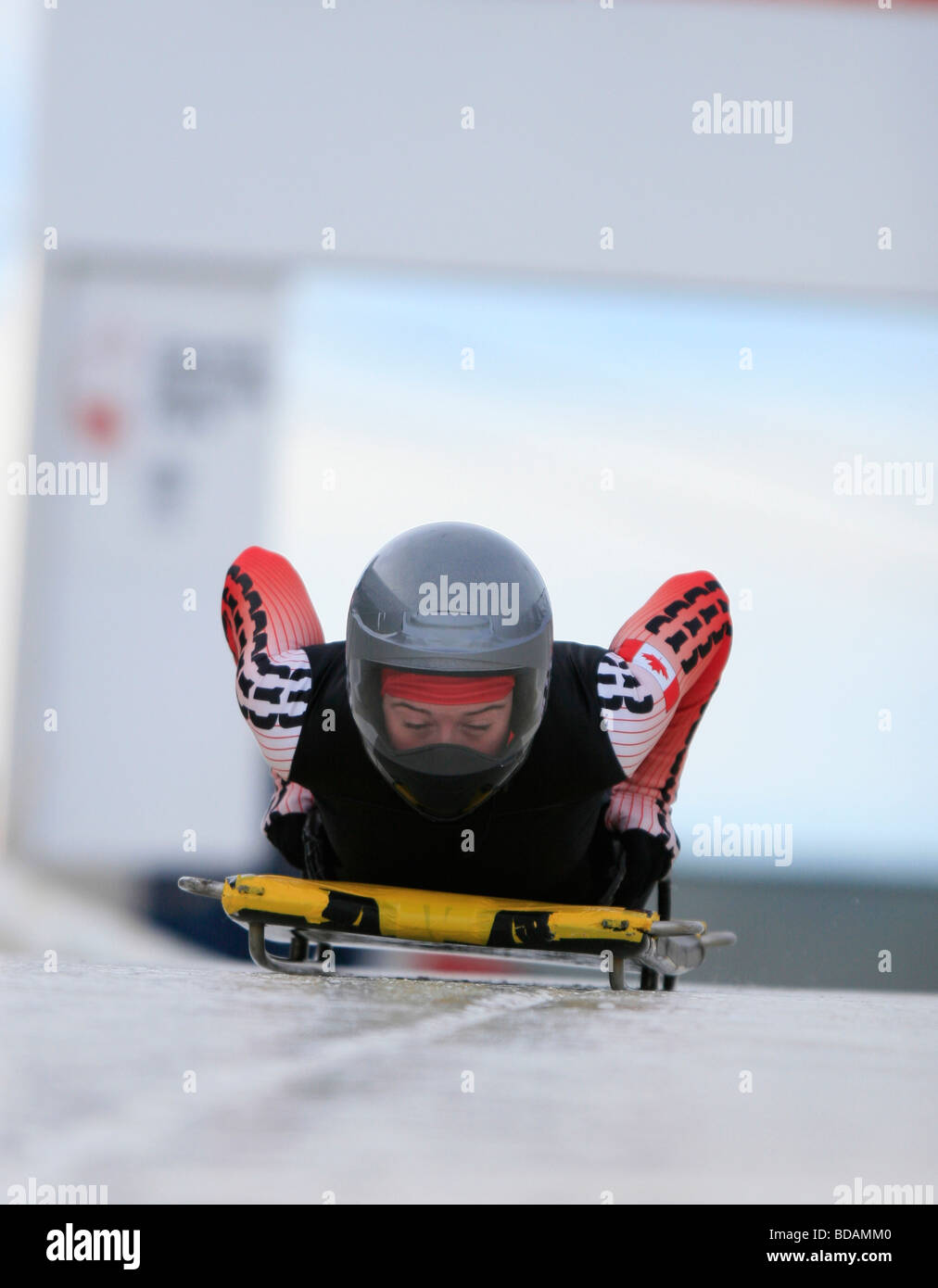 A skeleton racer dives down a track Stock Photo - Alamy