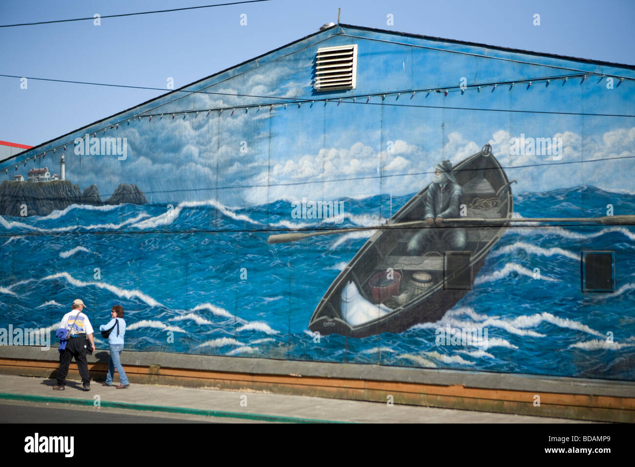 Buildings painted with nautical themed murals in Yaquina Bay Oregon ...