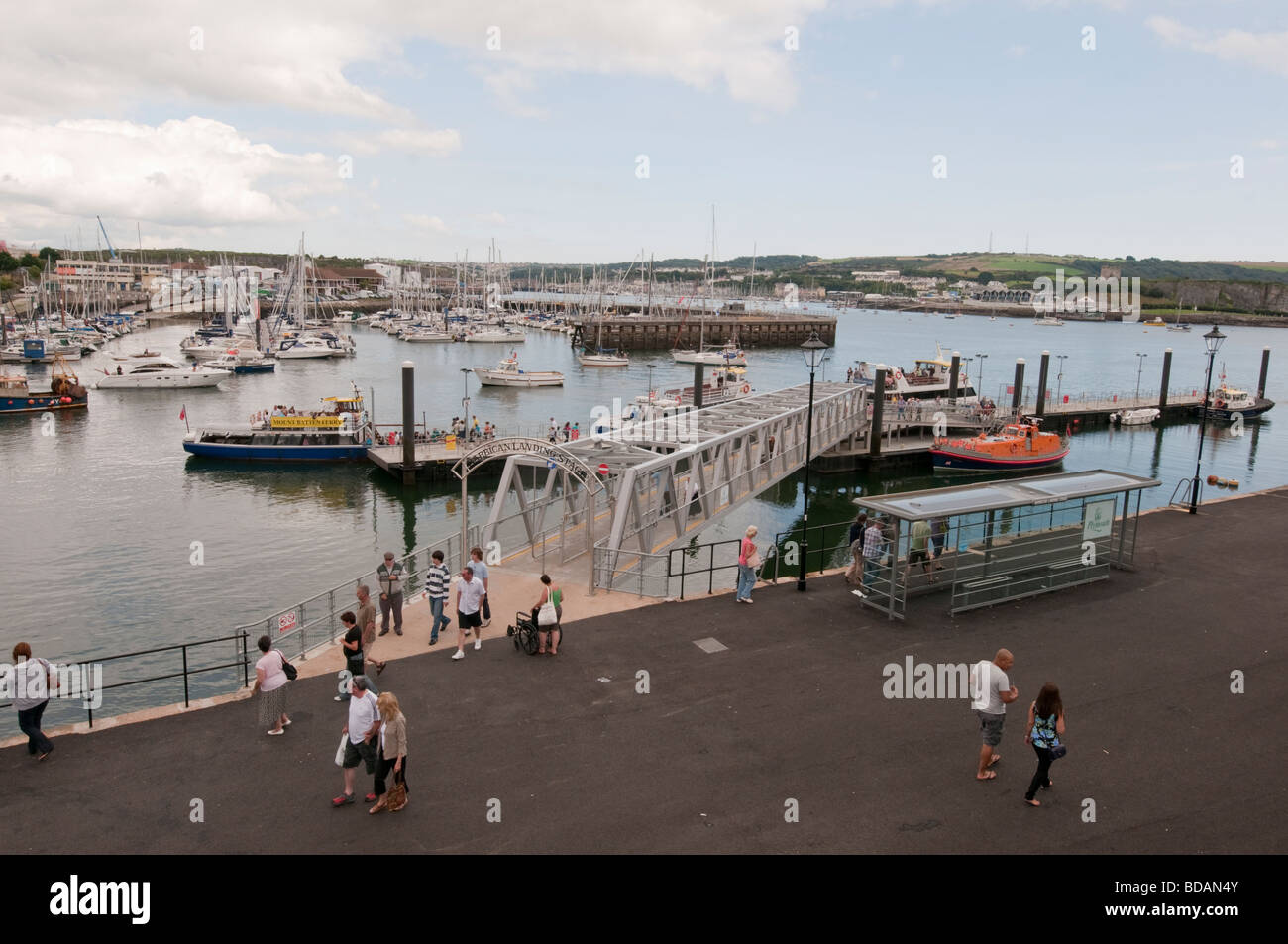 Pleasure boats, jetty red, water landing stage Stock Photo - Alamy